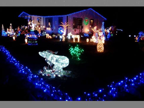 'We decorate to bring joy': Milligan couple shares Christmas lights ...