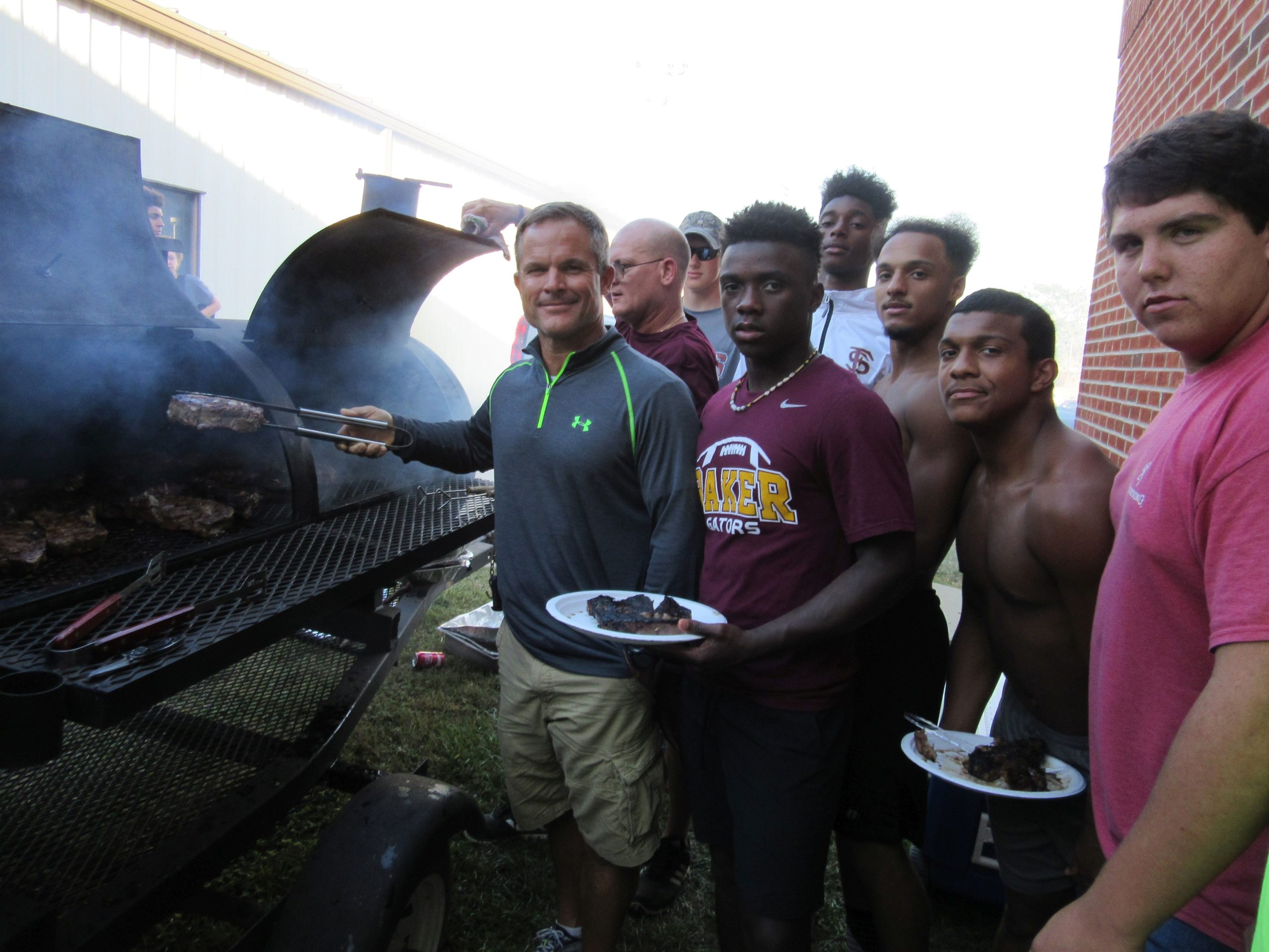 Baker football coach rewards players with steak dinner (PHOTOS ...