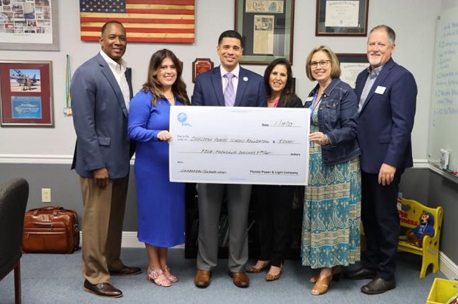 FPL donates $5,000 to Okaloosa County School District | Crestview News ...